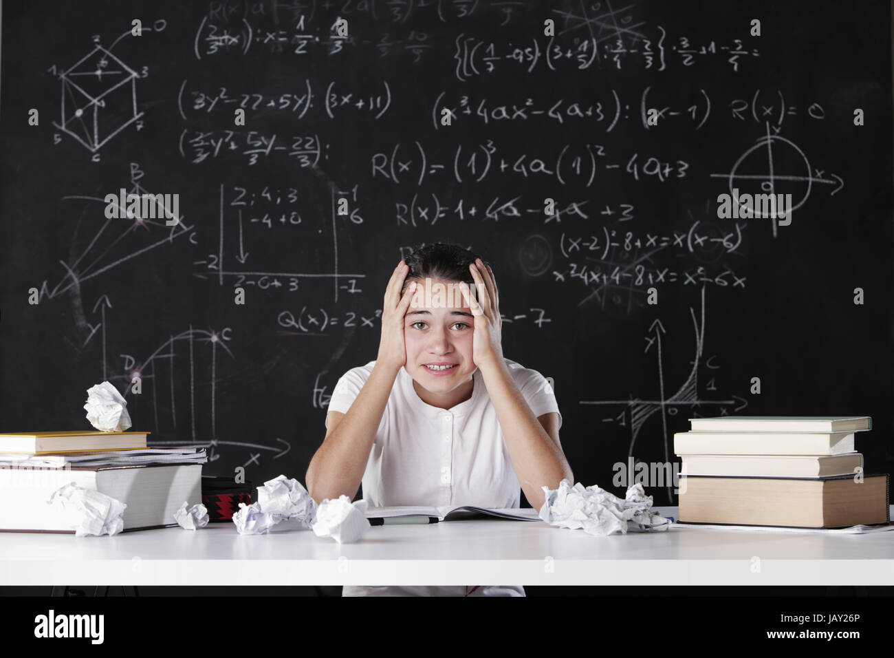 Girl fails to solve a mathematical task Stock Photo - Alamy