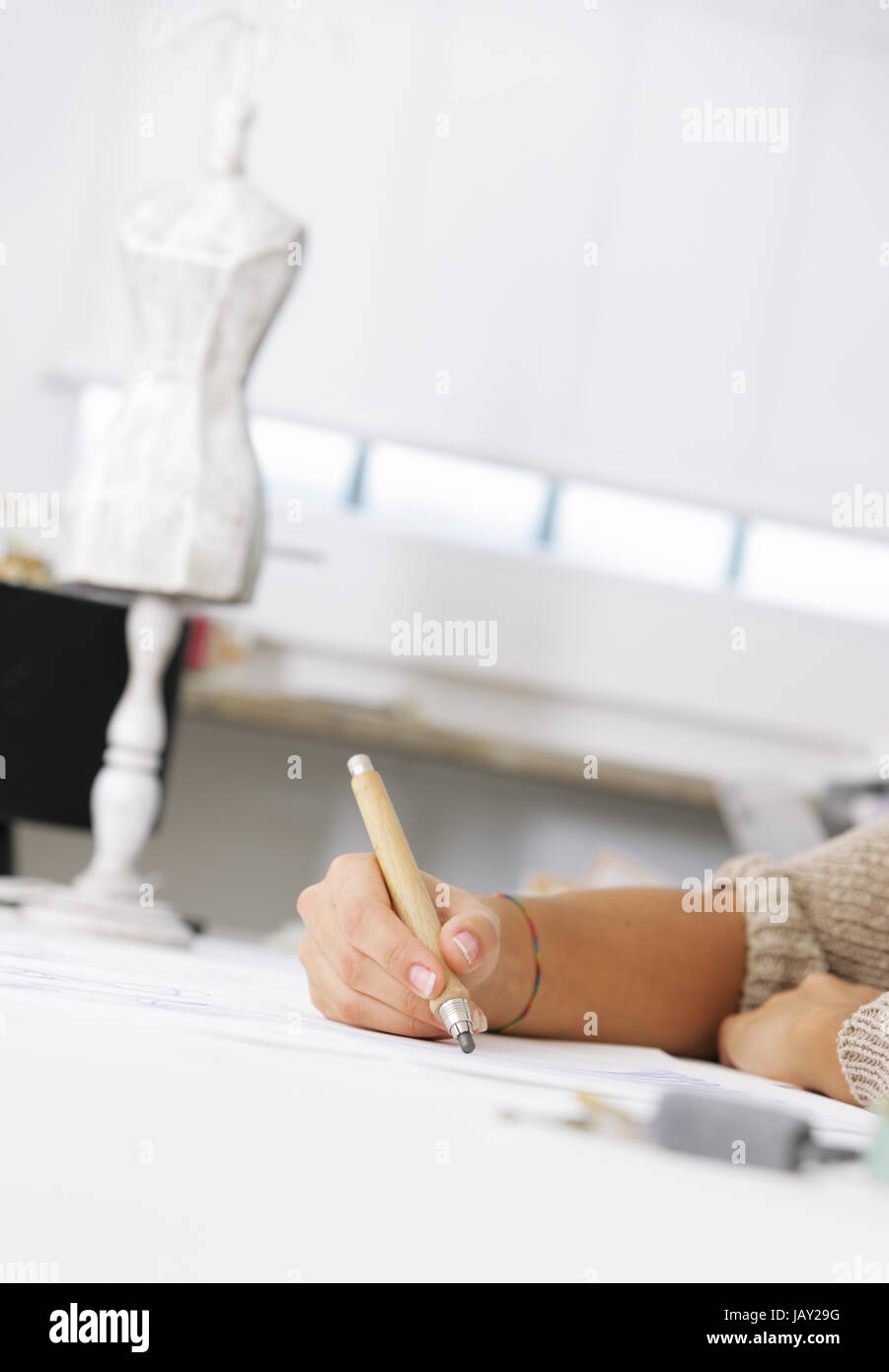 fashion designer, hand close up Stock Photo - Alamy