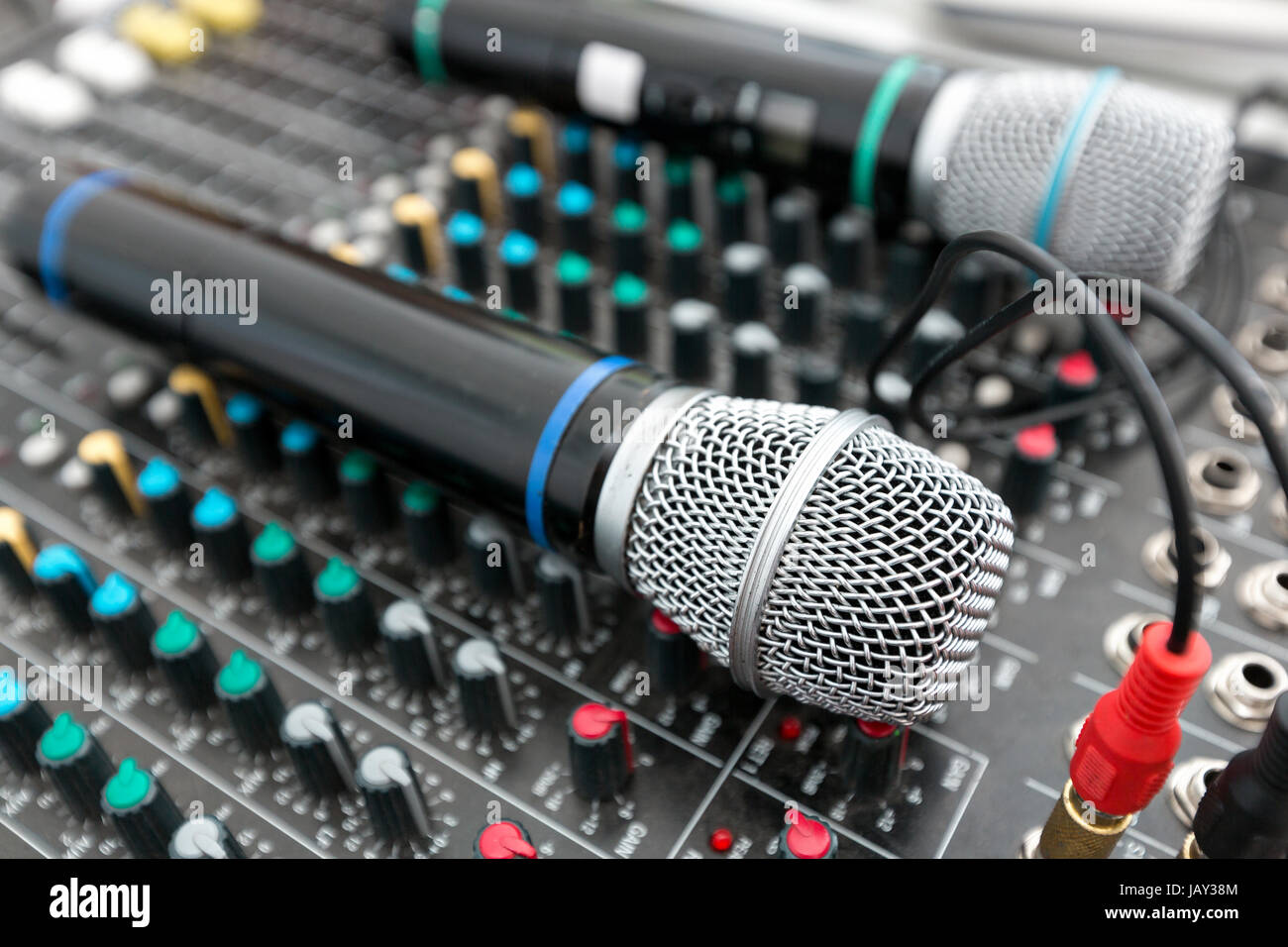 Microphone and sound mixer in public area concert stage Stock Photo - Alamy