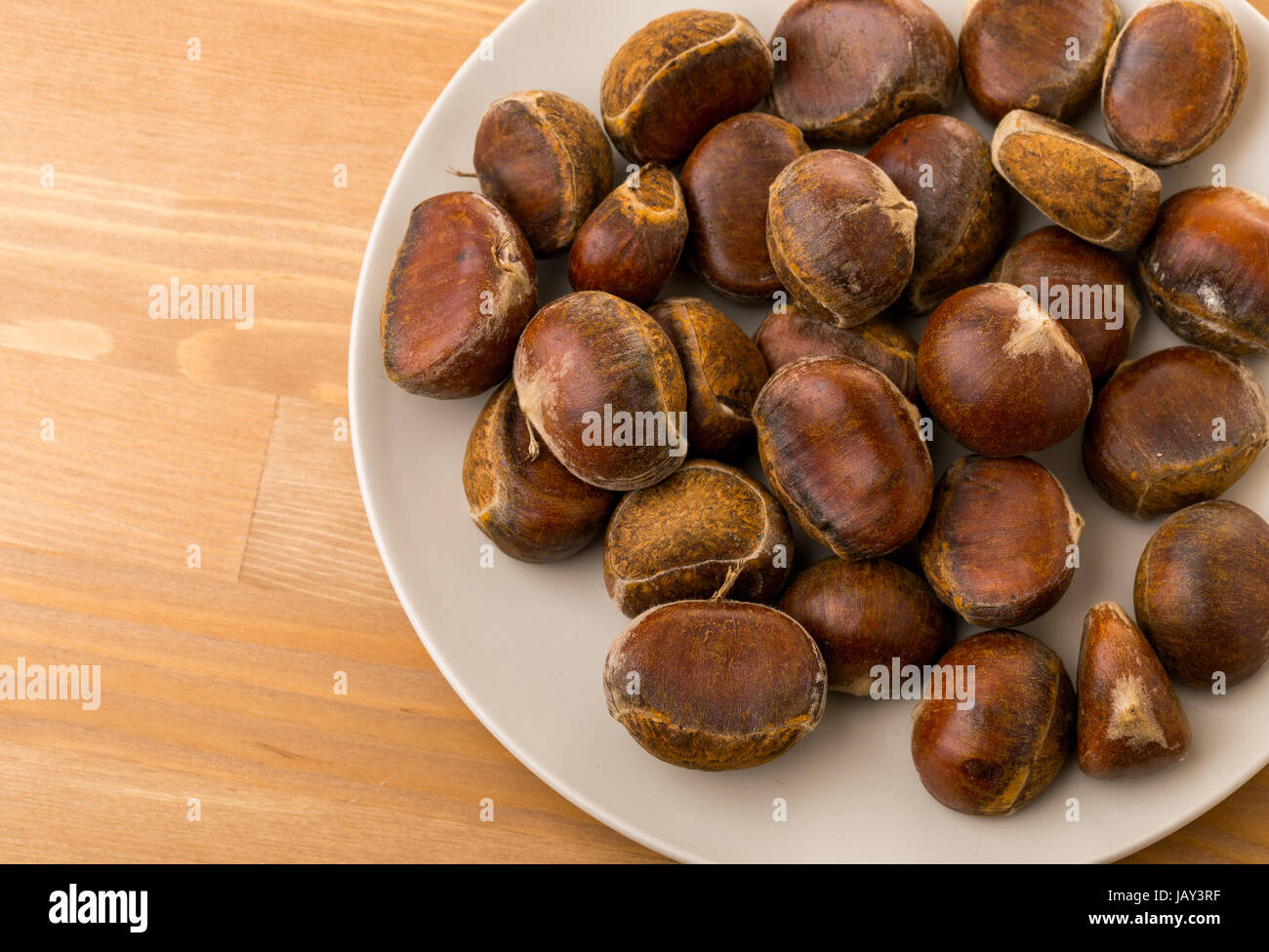 Chestnut on plate Stock Photo - Alamy