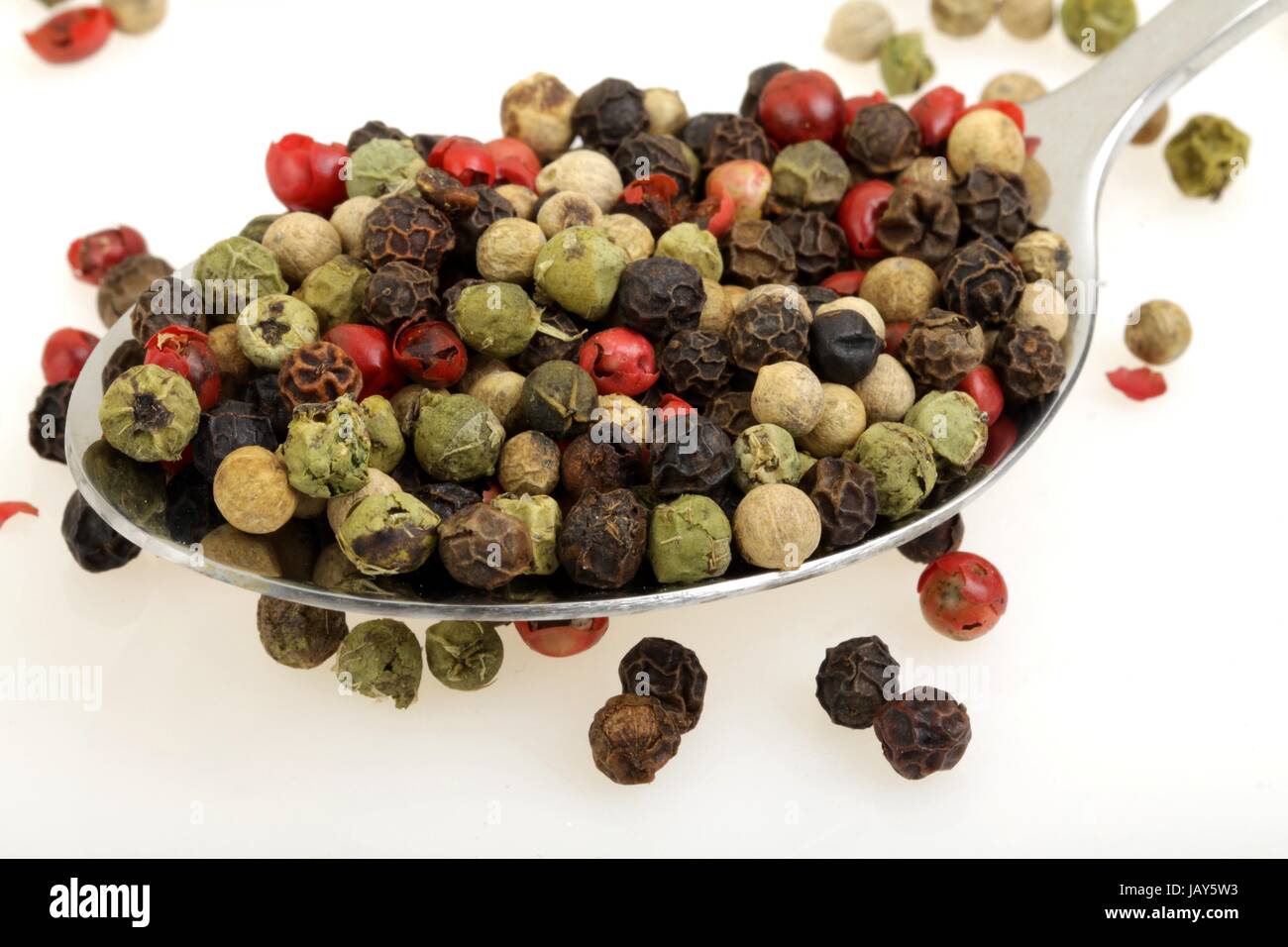 colorful pepper photographed on a spoon Stock Photo - Alamy
