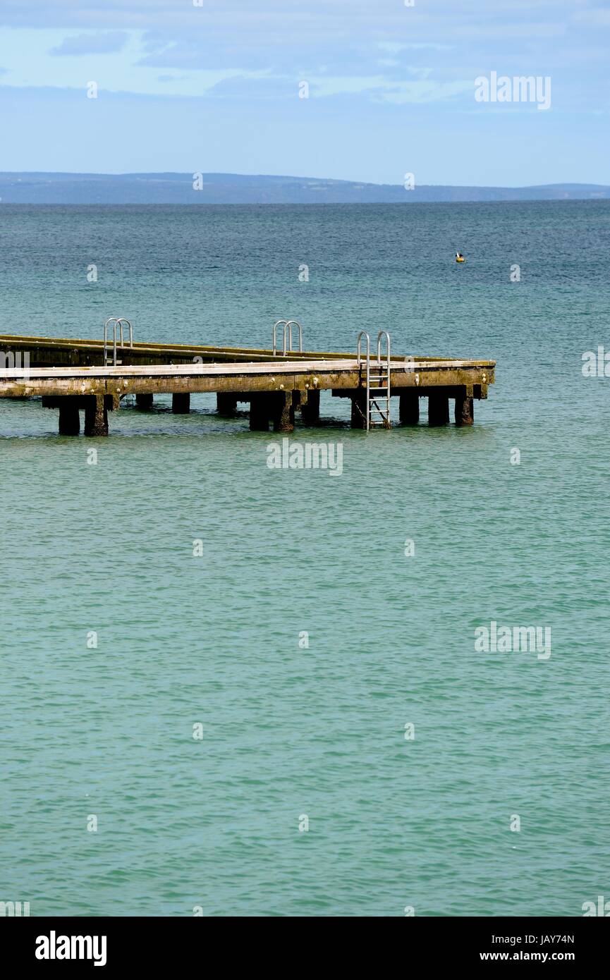 An image of a coastal seaside jetty Stock Photo - Alamy