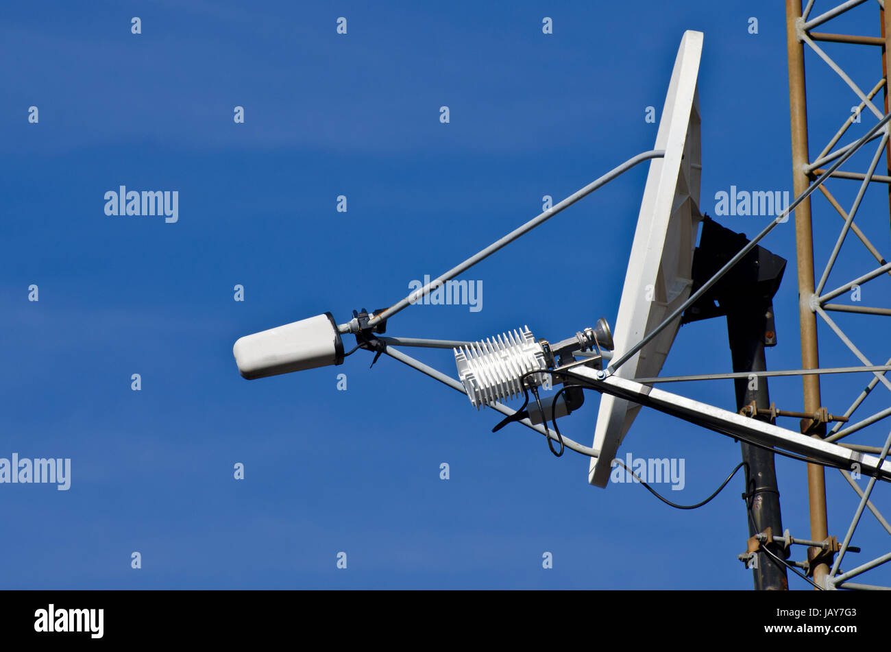 Satellite Dish on Communications Tower Stock Photo - Alamy