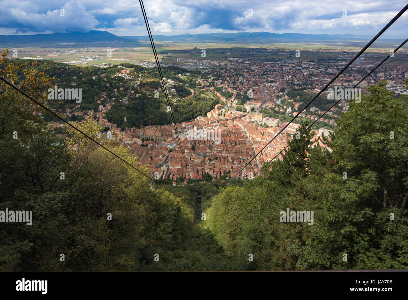the ropeway with overlooking panorama in distance medieval architecture ...
