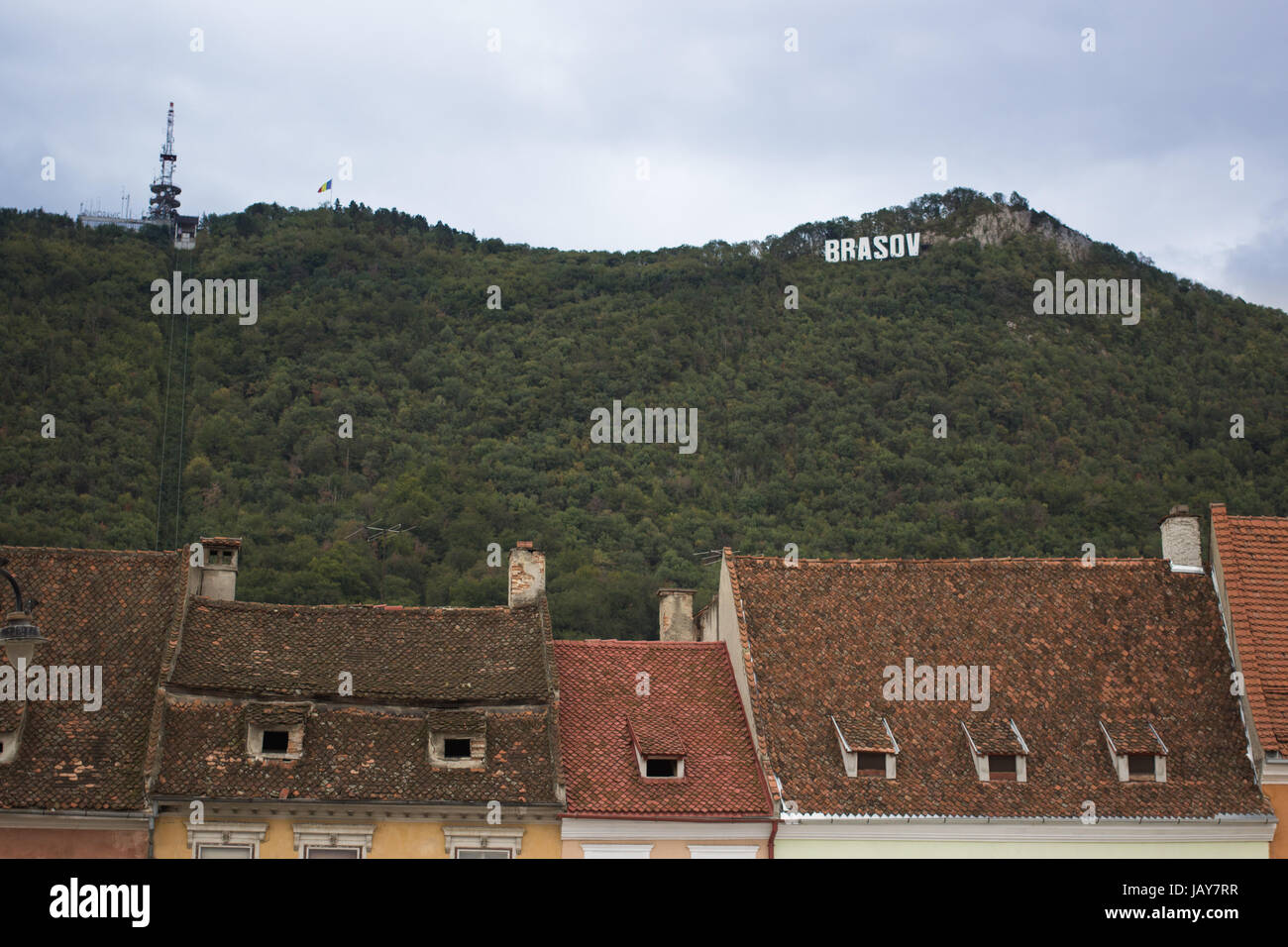 the mountain with inscription sign Brasov alike Hollywood and the red ...