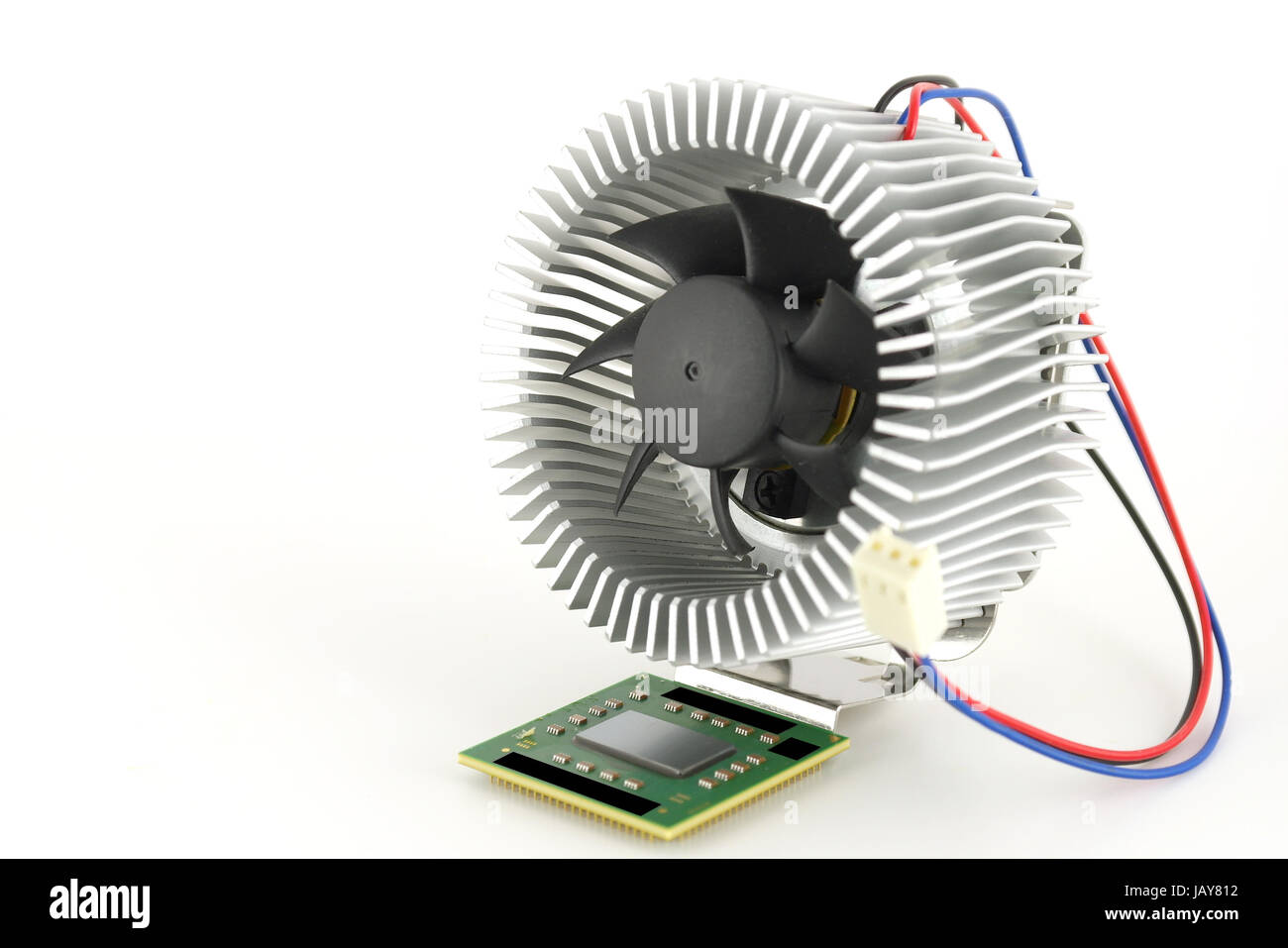 Processor and fan with radiator over white Stock Photo - Alamy
