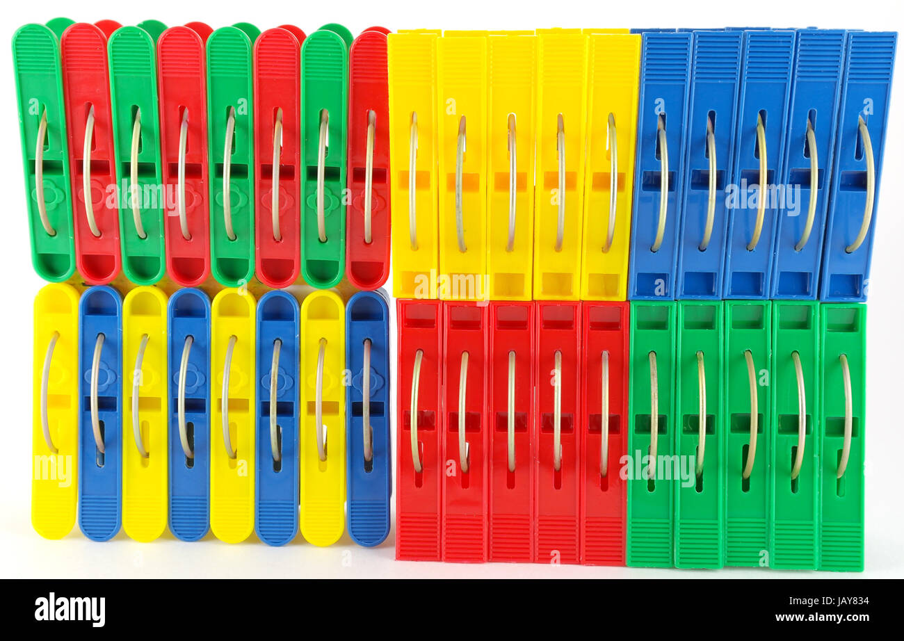 Color clothes-pegs over white Stock Photo - Alamy