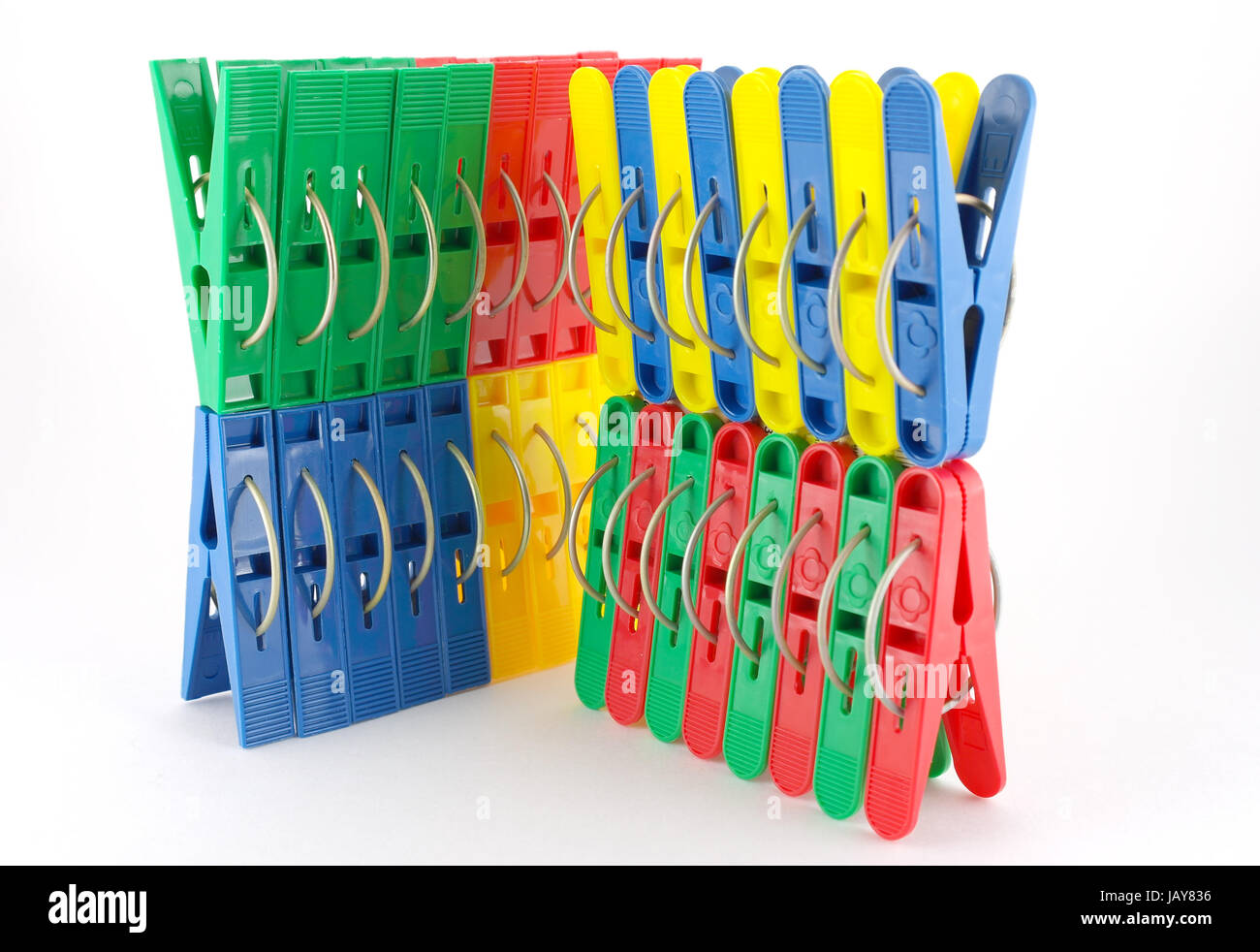 Color clothes-pegs over white Stock Photo - Alamy