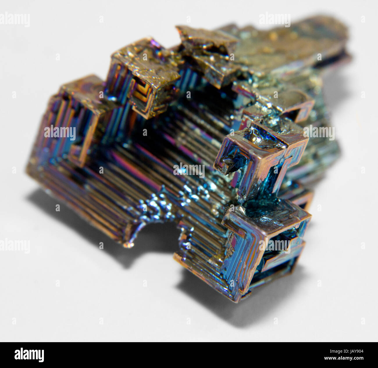 a multicolored Bismuth crystal in light back Stock Photo - Alamy