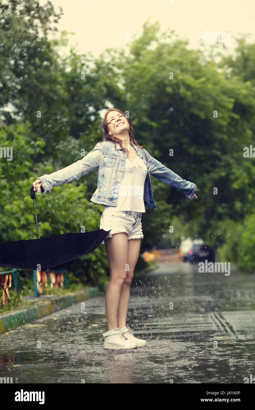 Cheerful wet teen girl hi-res stock photography and images - Alamy