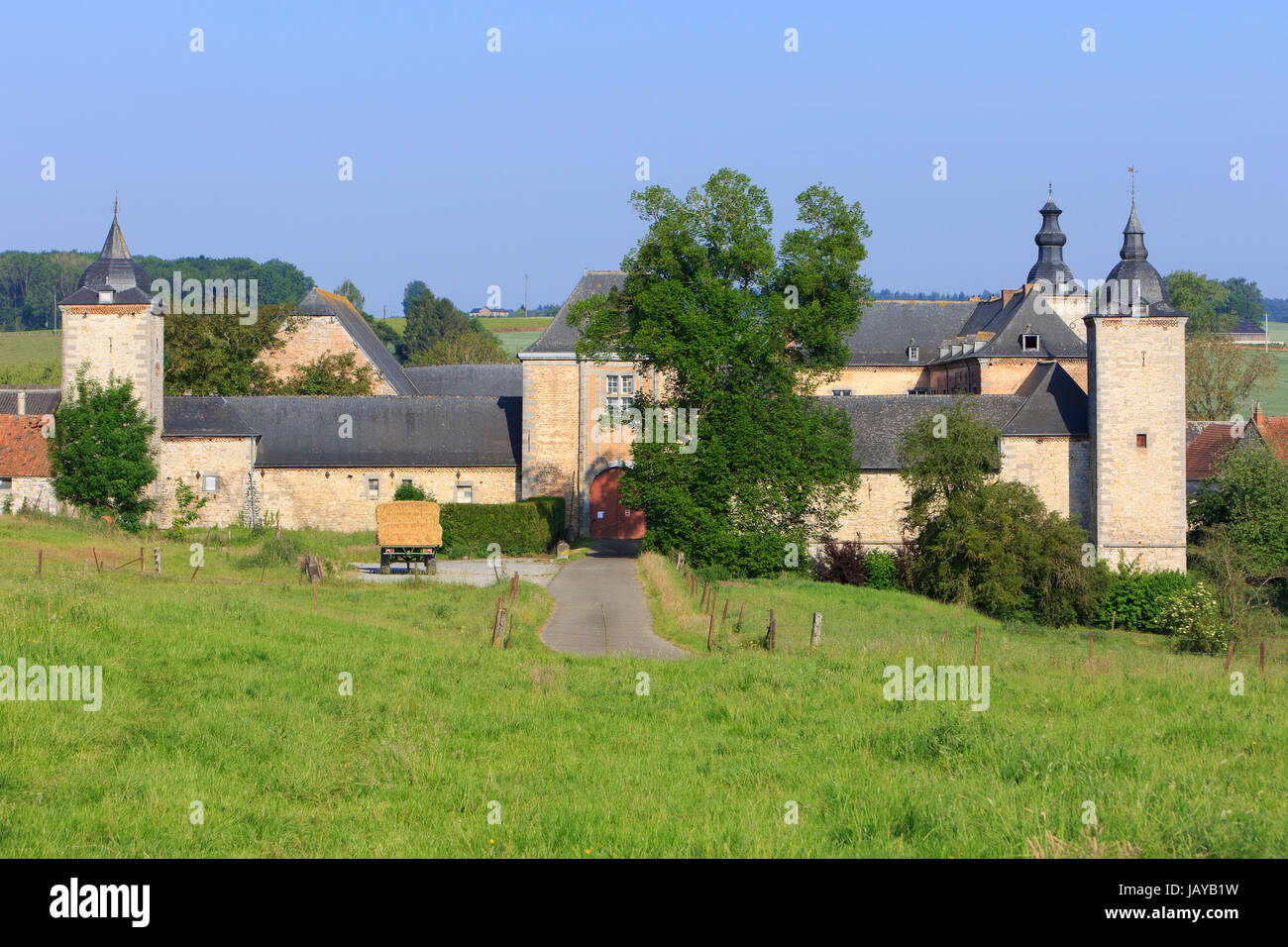 The 17th-century Falaen Castle (fortified farmhouse) in Falaen, Belgium ...