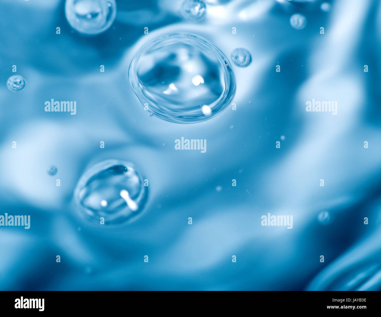 Water and bubbles. Moving surface of the water Stock Photo - Alamy