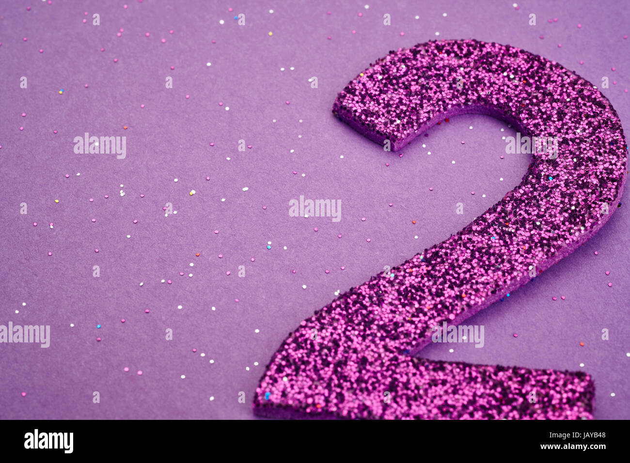 Number two purple color over a purple background. Anniversary ...