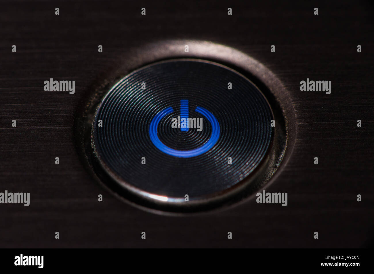 Start button with blue light Stock Photo - Alamy