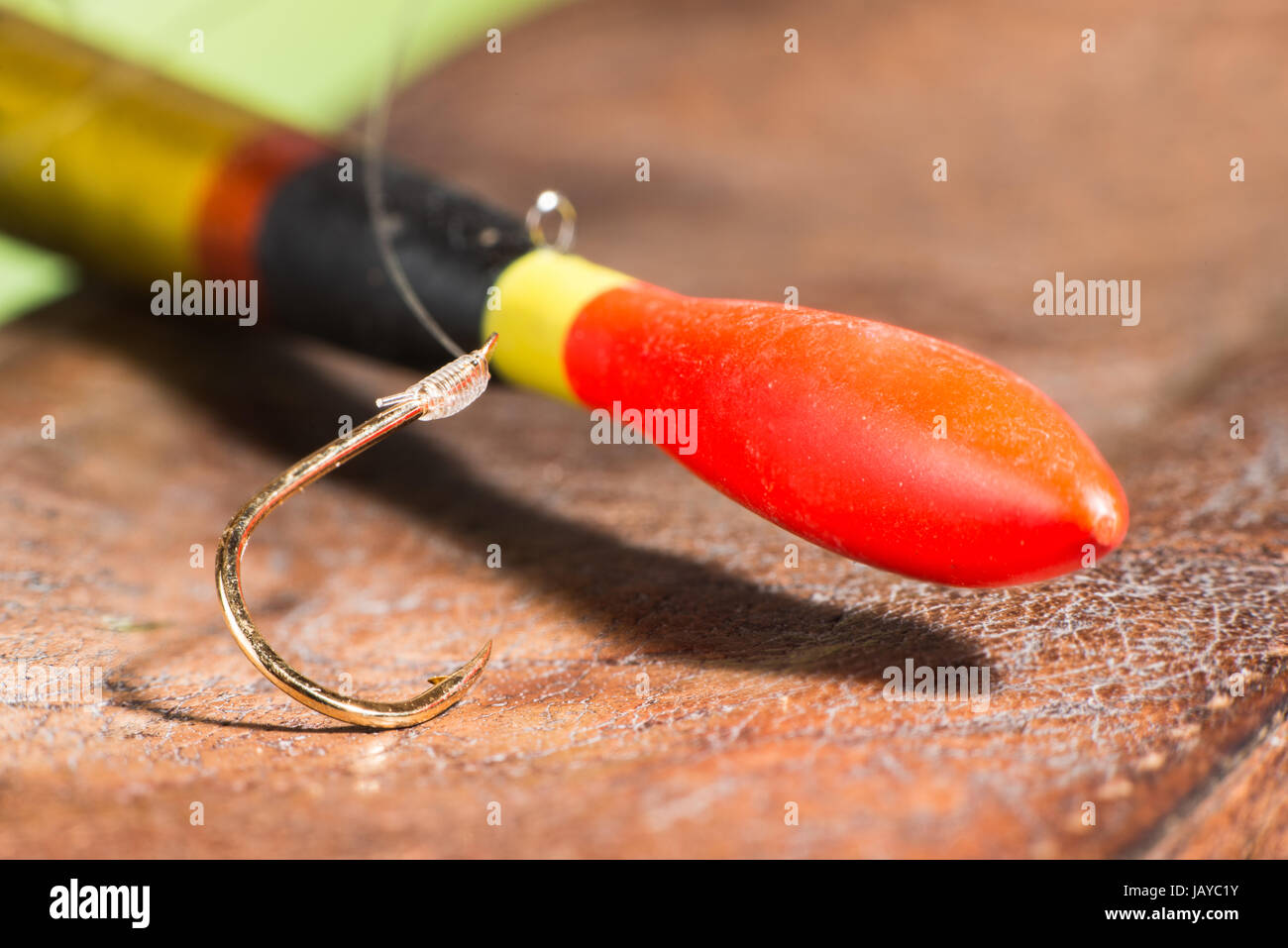 Hooks for fishing and float. Macro shot. Natural look Stock Photo - Alamy