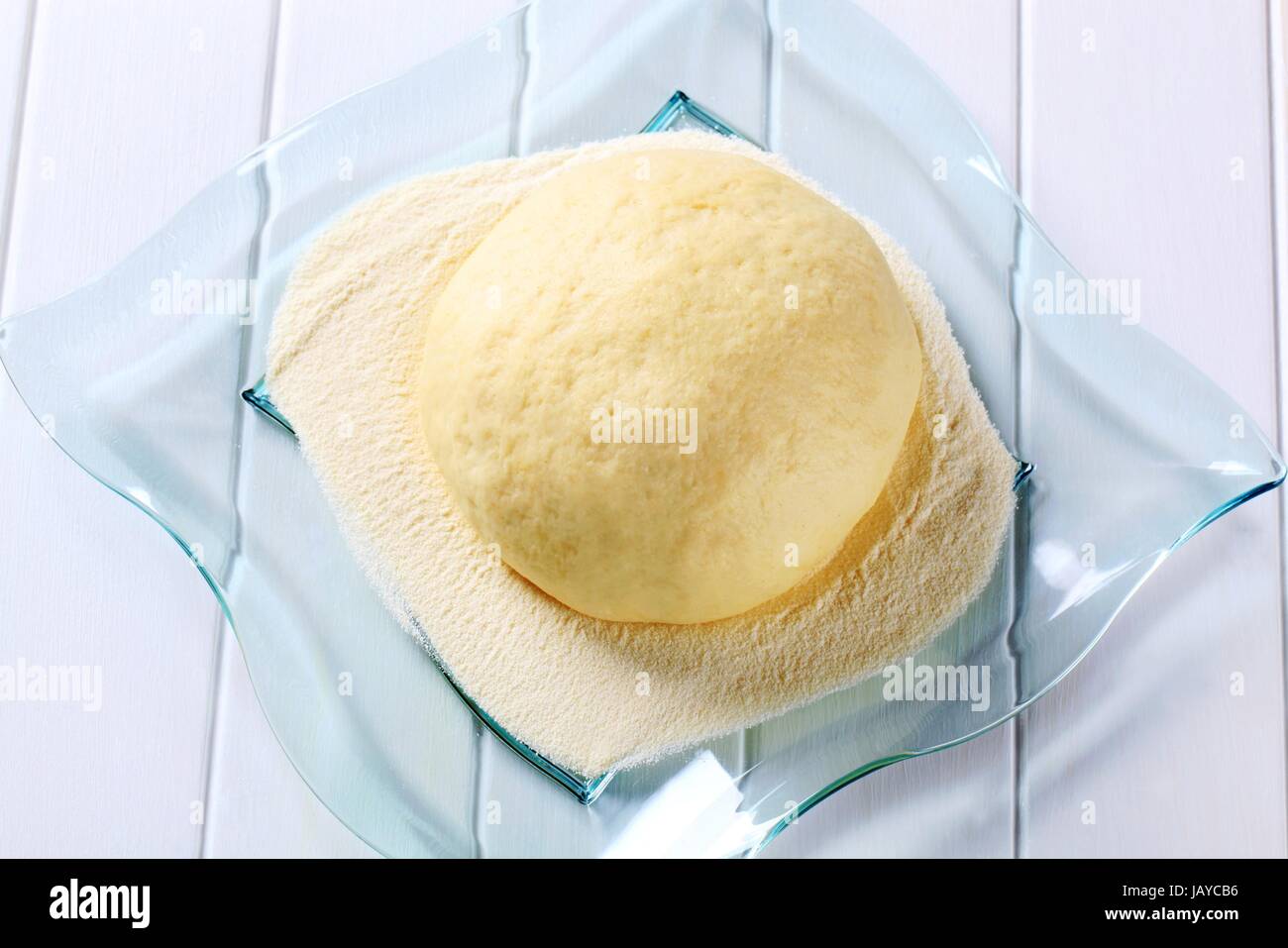 Yeast dough on a plate Stock Photo - Alamy