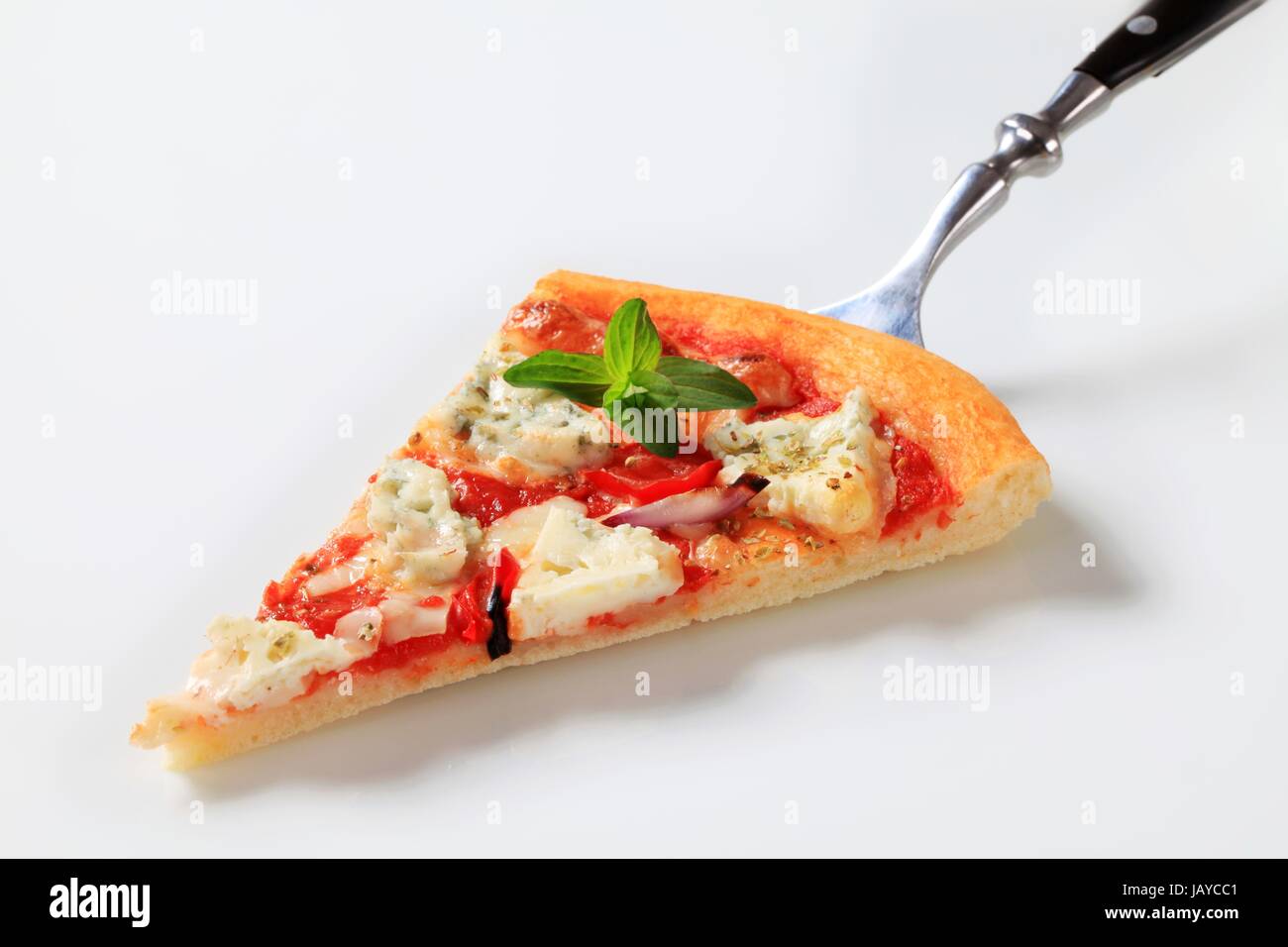 Slice of pizza on a slice server Stock Photo - Alamy
