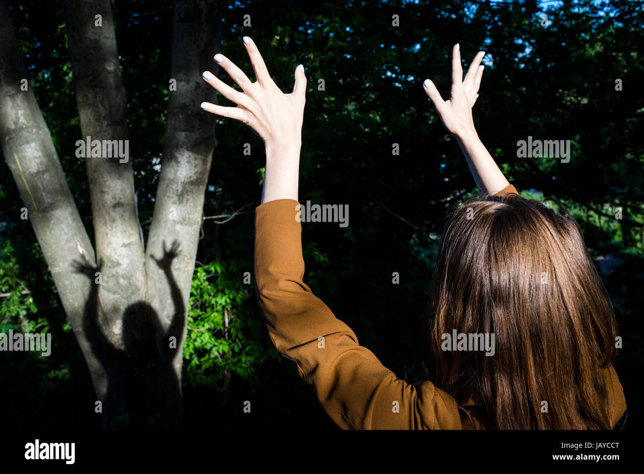 Shadow figures with hands hi-res stock photography and images - Alamy