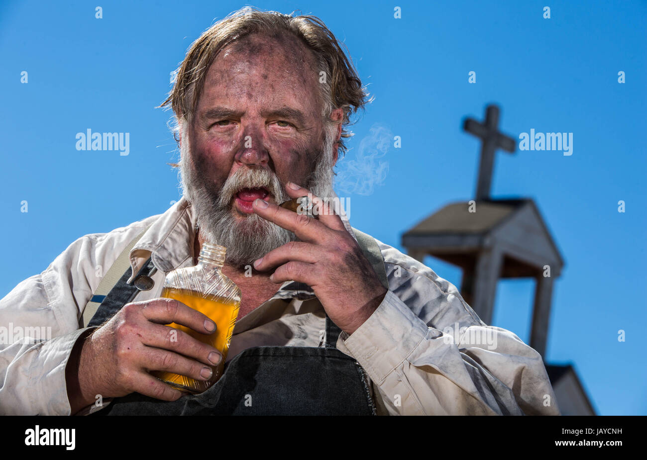 Cowboy drinking whiskey hi-res stock photography and images - Alamy