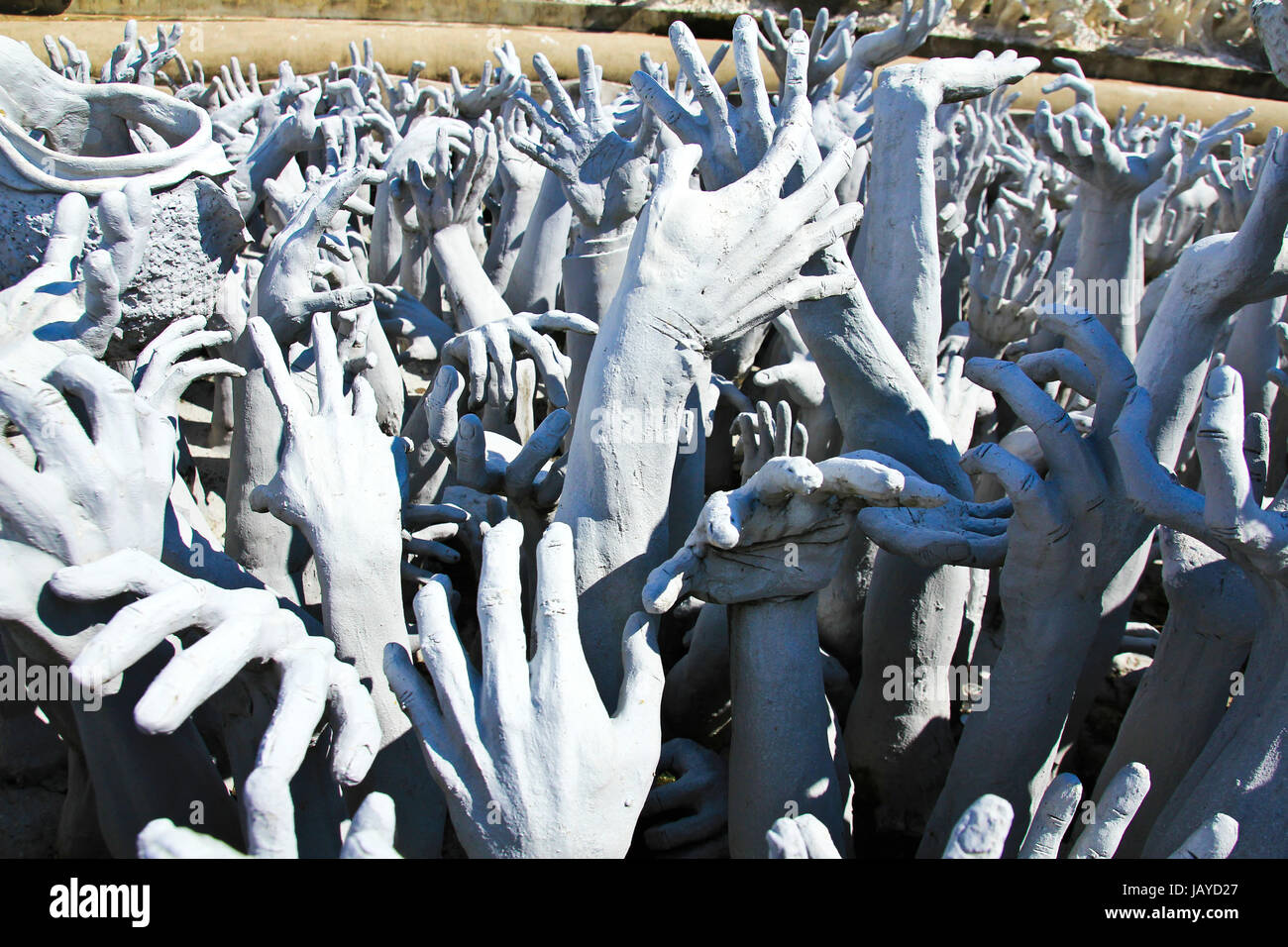 Hand from hell at Rong Khun temple,Chiang Rai northern Thailand Stock ...