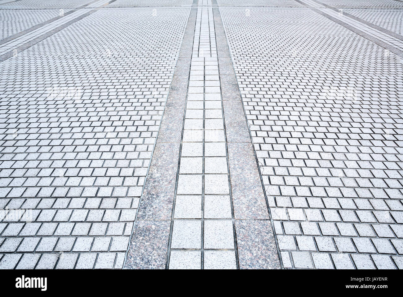 Perspective of concrete brick pavement road Stock Photo - Alamy