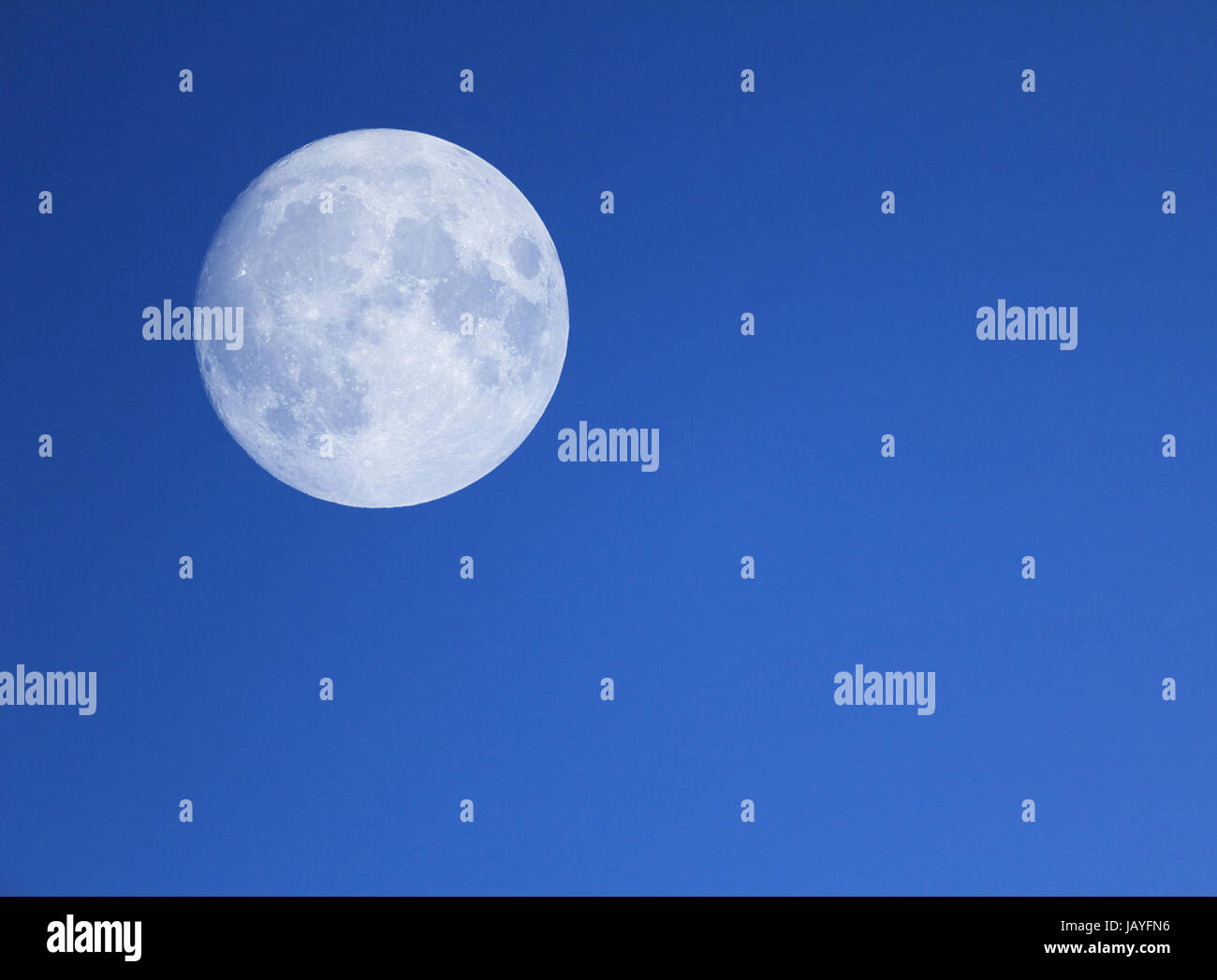 Big moon in the night blue sky Stock Photo - Alamy