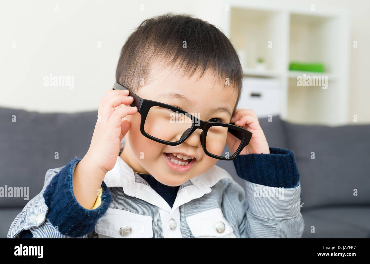 Asian little boy wear glasses Stock Photo - Alamy