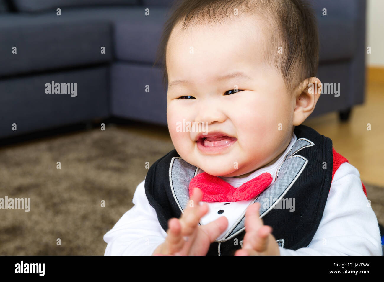 Little baby feel happy Stock Photo - Alamy