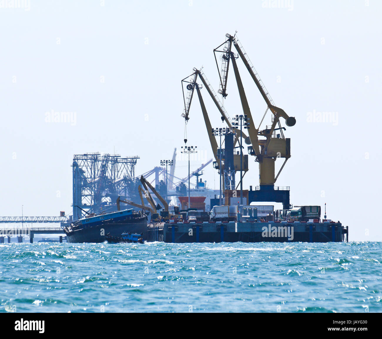 Industrial Container Cargo freight ship with working crane bridge Stock ...