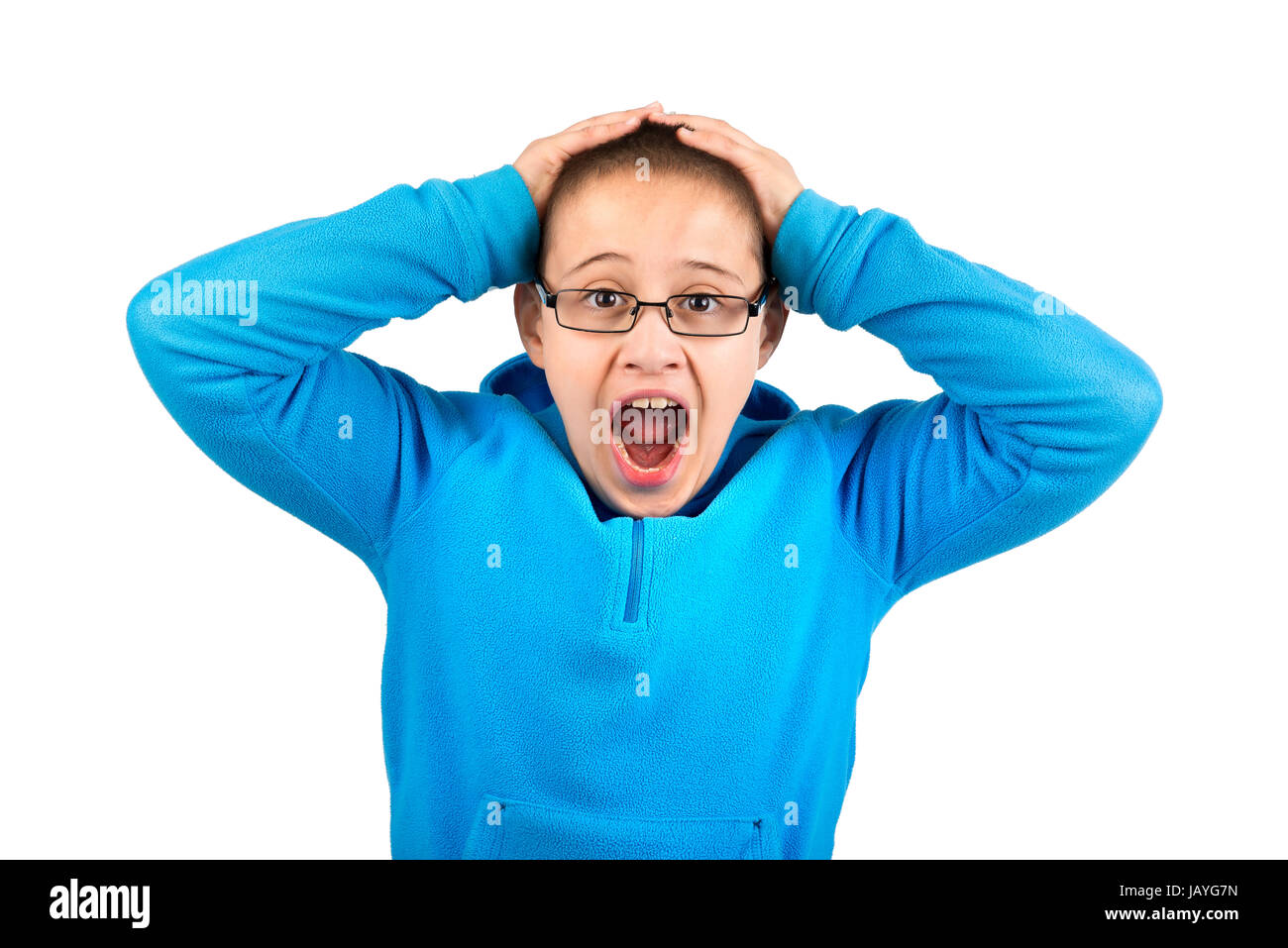 Young boy screaming isolated in white Stock Photo - Alamy