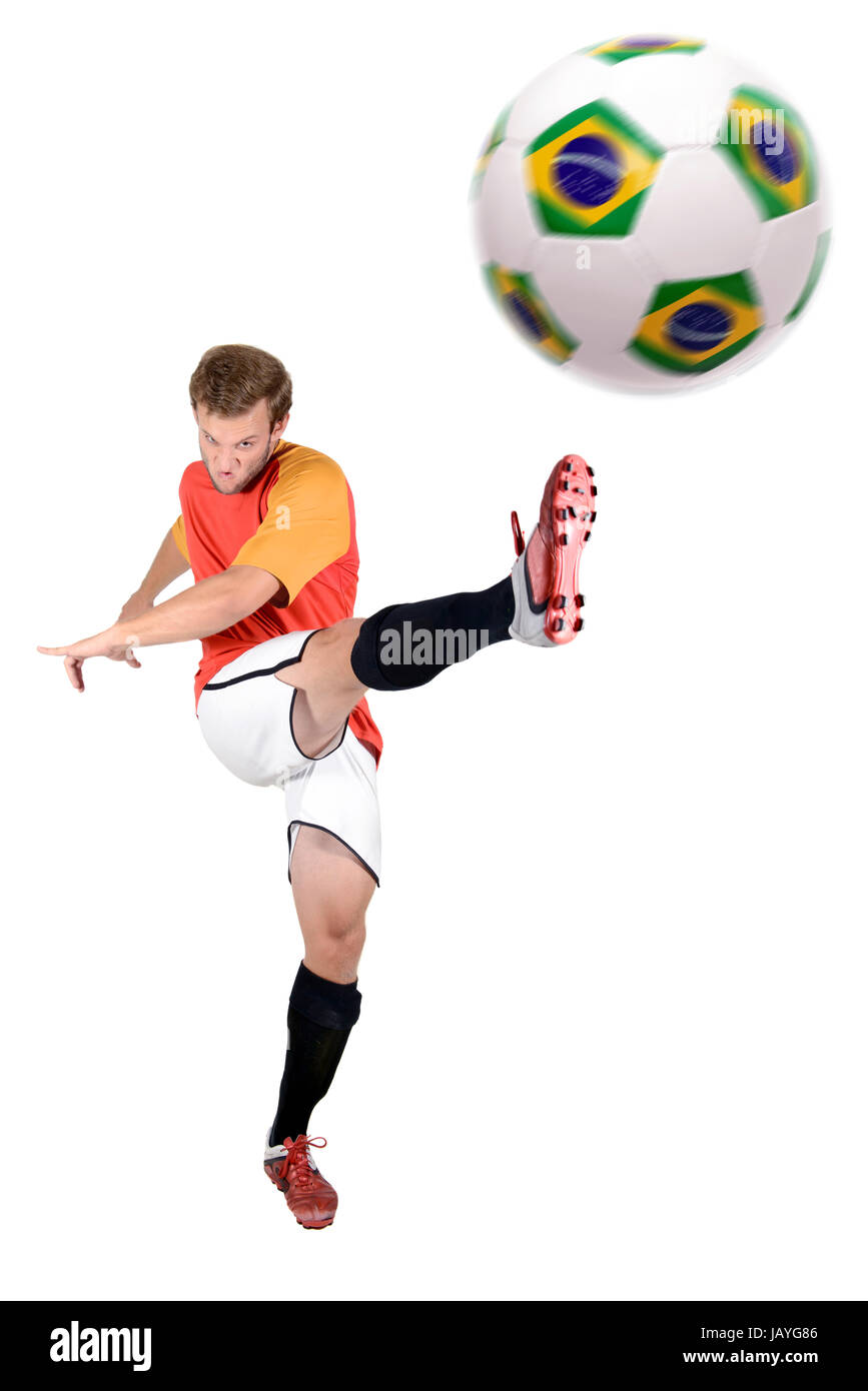 Football player kicking a ball isolated in white Stock Photo - Alamy
