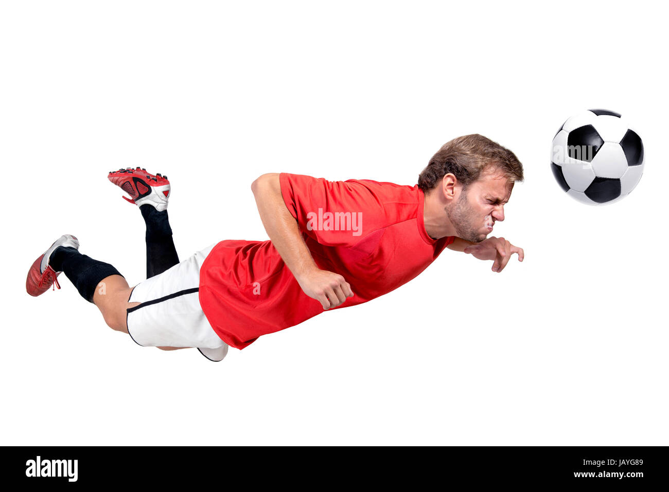 Football player with a ball isolated in white Stock Photo - Alamy