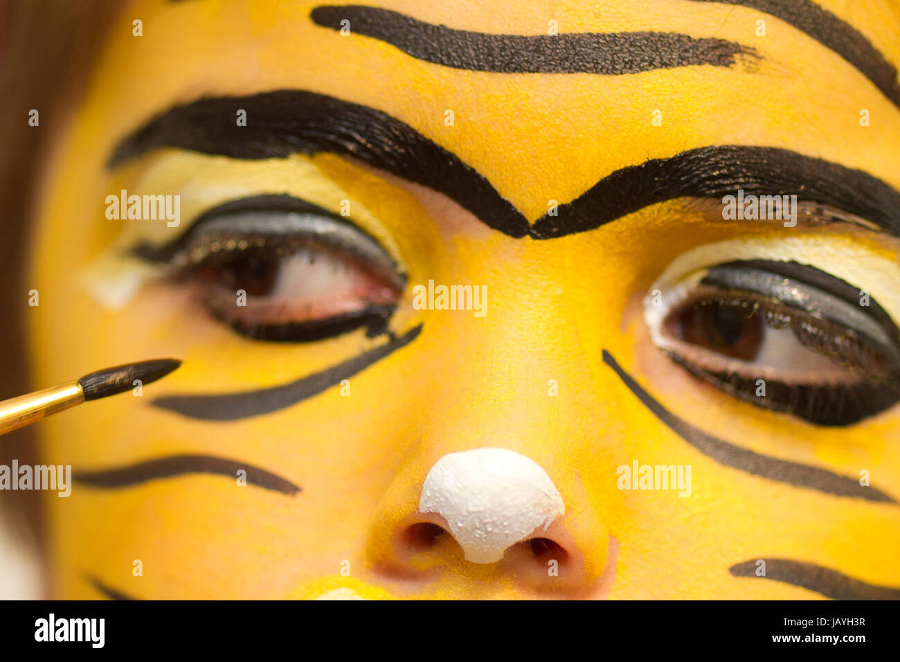 face painting at home Stock Photo - Alamy
