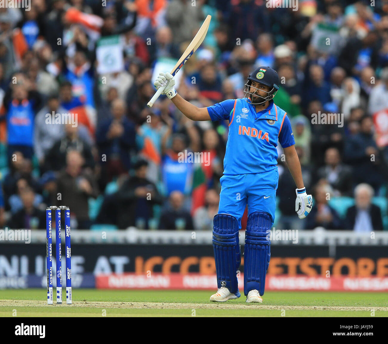 Indias rohit sharma raises hi-res stock photography and images - Alamy