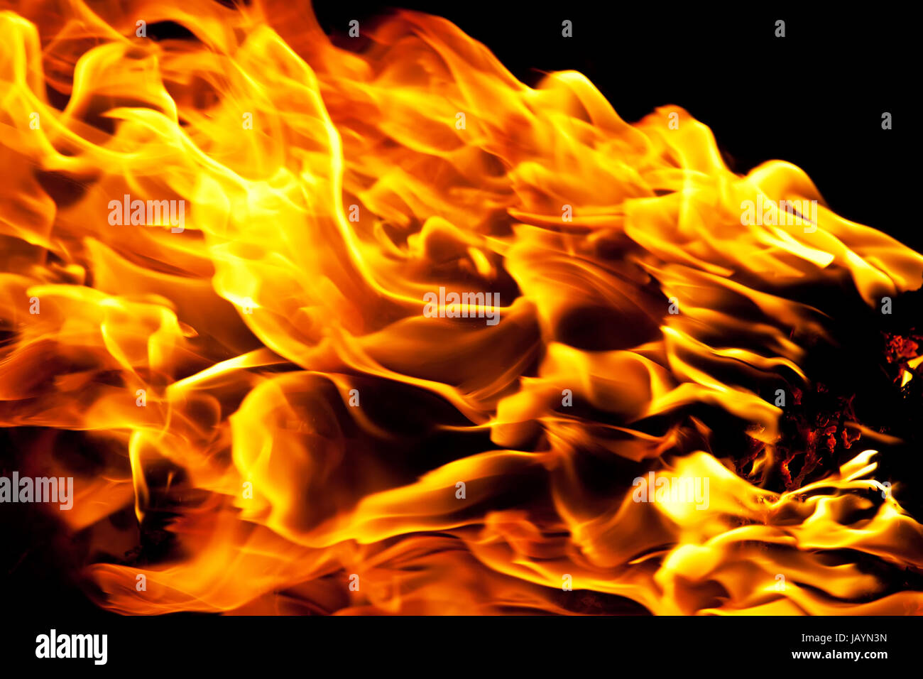 Beautiful yellow and orange hot fire on black background Stock Photo ...