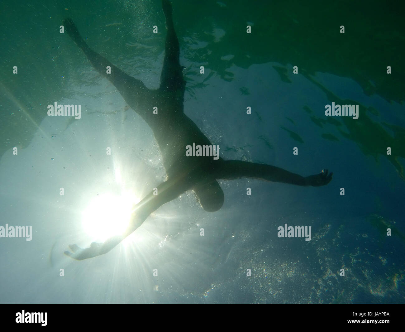 Man drowning viewed from below underwater Stock Photo - Alamy