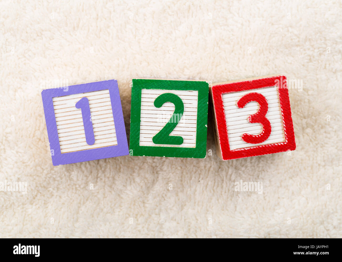 123 toy block with towel background Stock Photo - Alamy
