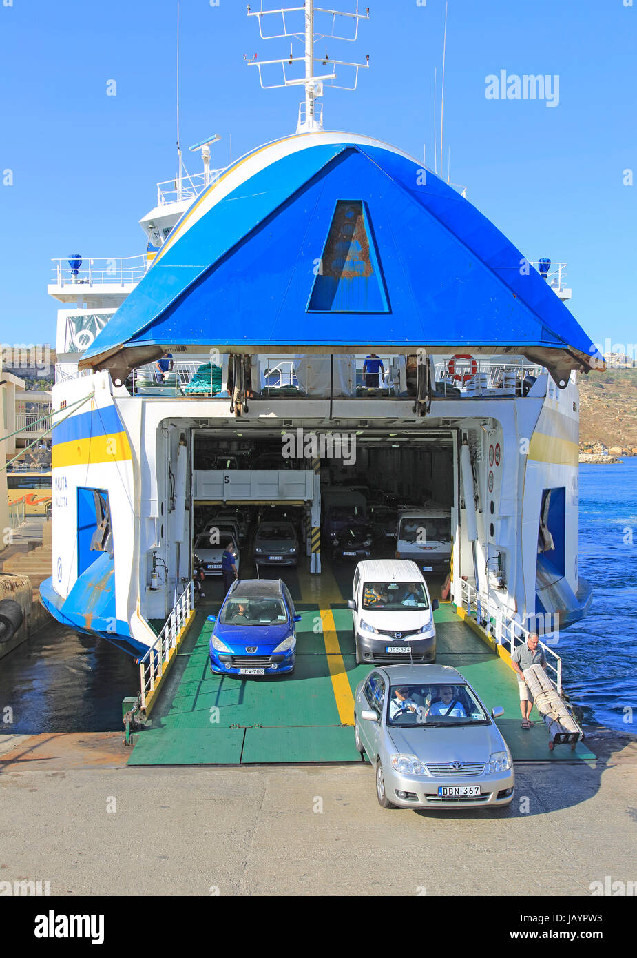 Vehicle ferry disembarkation at port, Gozo Channel Line Ferries, Mgarr ...