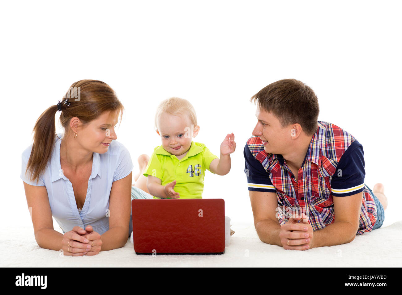 Happy family with notebook on a white background Stock Photo - Alamy