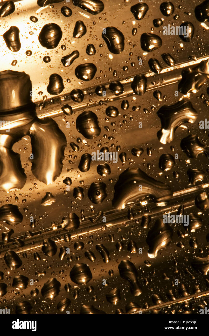 abstract gold drop in a plastic material Stock Photo - Alamy