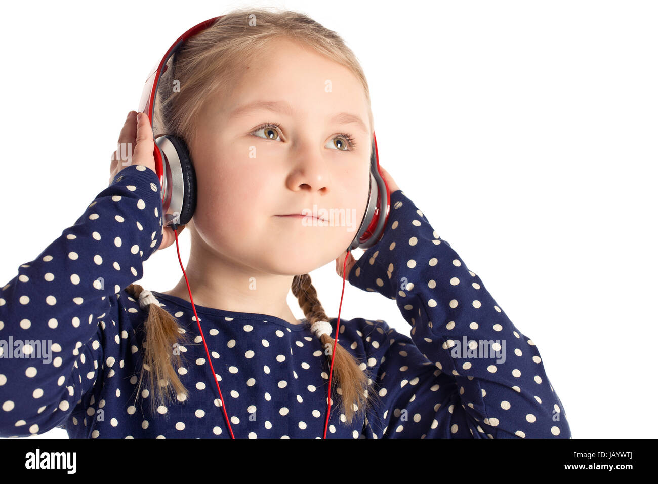 little girl with headphones on white background Stock Photo - Alamy