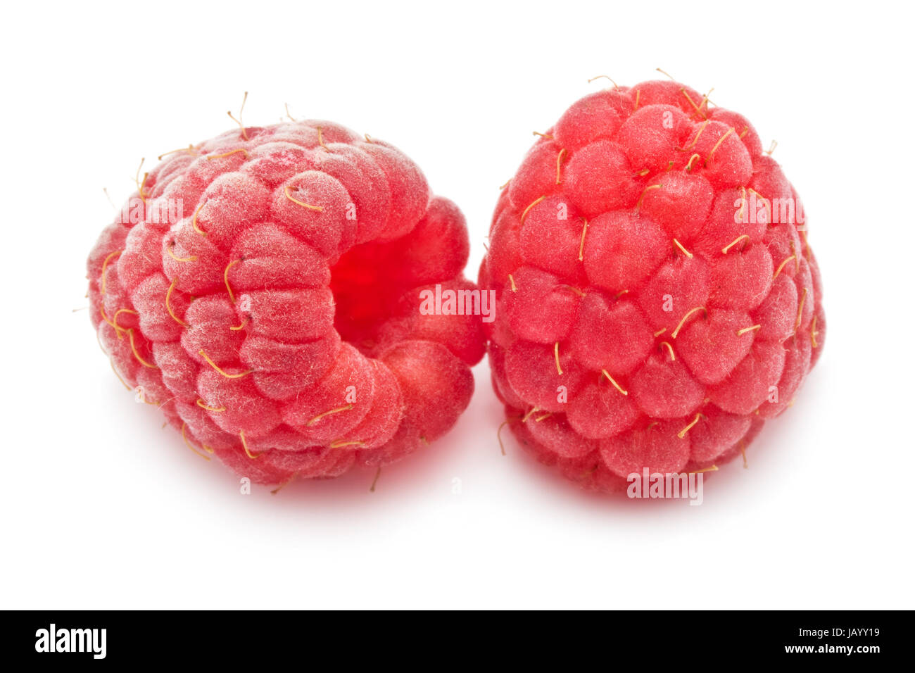 Ripe red raspberries isolated on white background Stock Photo - Alamy