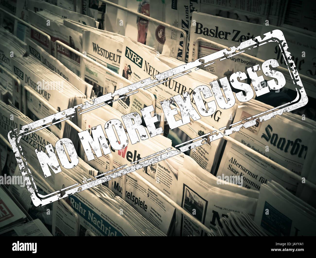 Newspaper stand with No More Excuses Text Stock Photo - Alamy