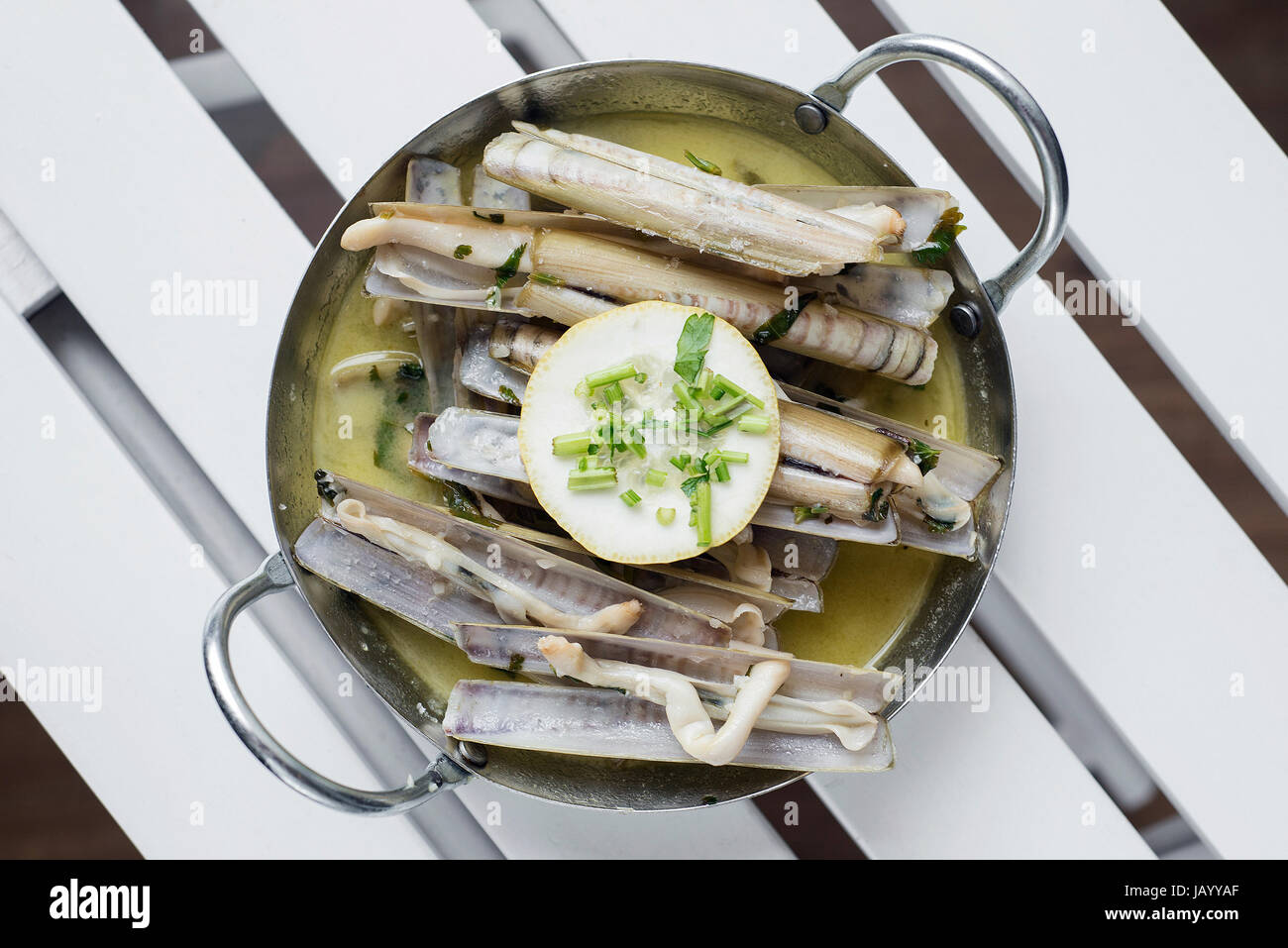 portuguese fresh razor shell seafood steamed in garlic herb white wine ...
