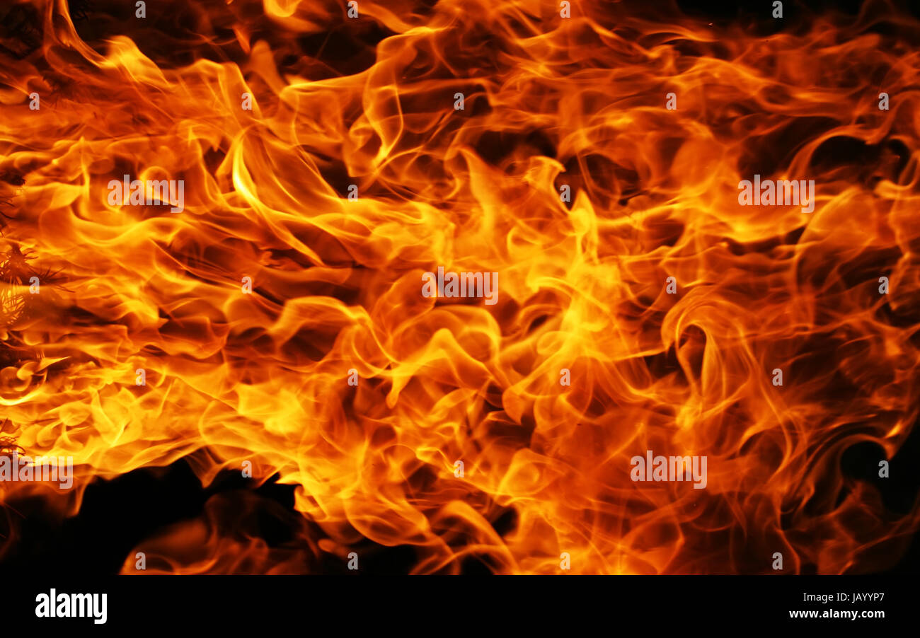 Beautiful yellow and orange hot fire on black background Stock Photo ...