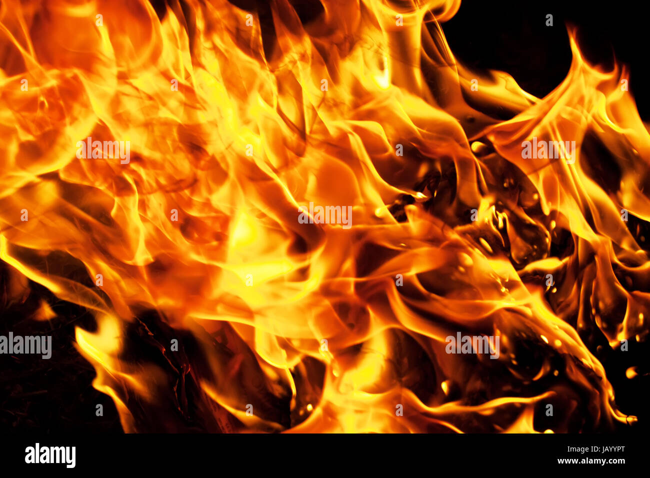 Beautiful yellow and orange hot fire on black background Stock Photo ...