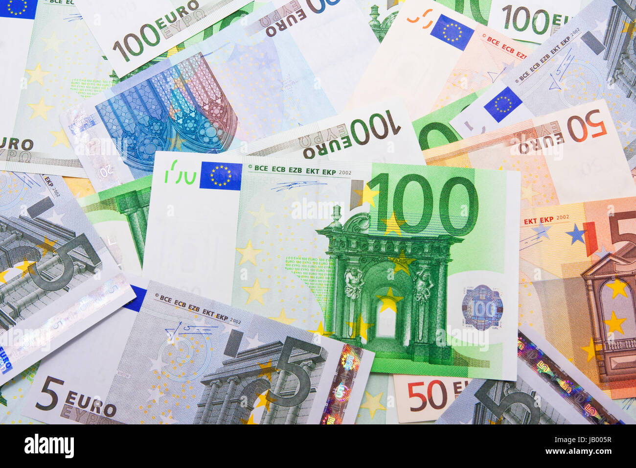 Many euro banknotes making european currency background Stock Photo - Alamy