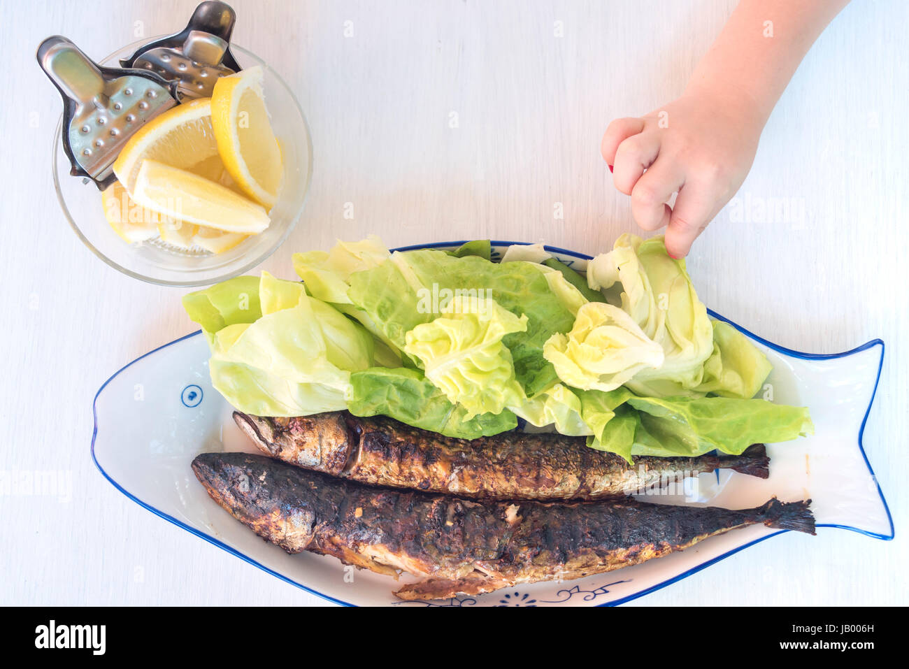 Fish plate grilled table hi-res stock photography and images - Alamy