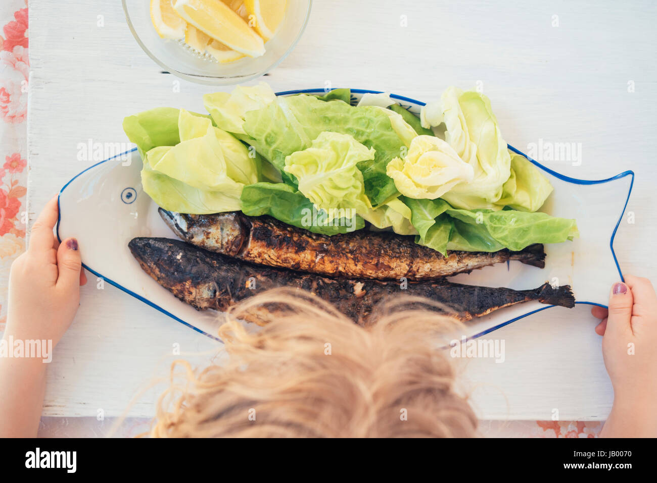 Eats fish hi-res stock photography and images - Alamy