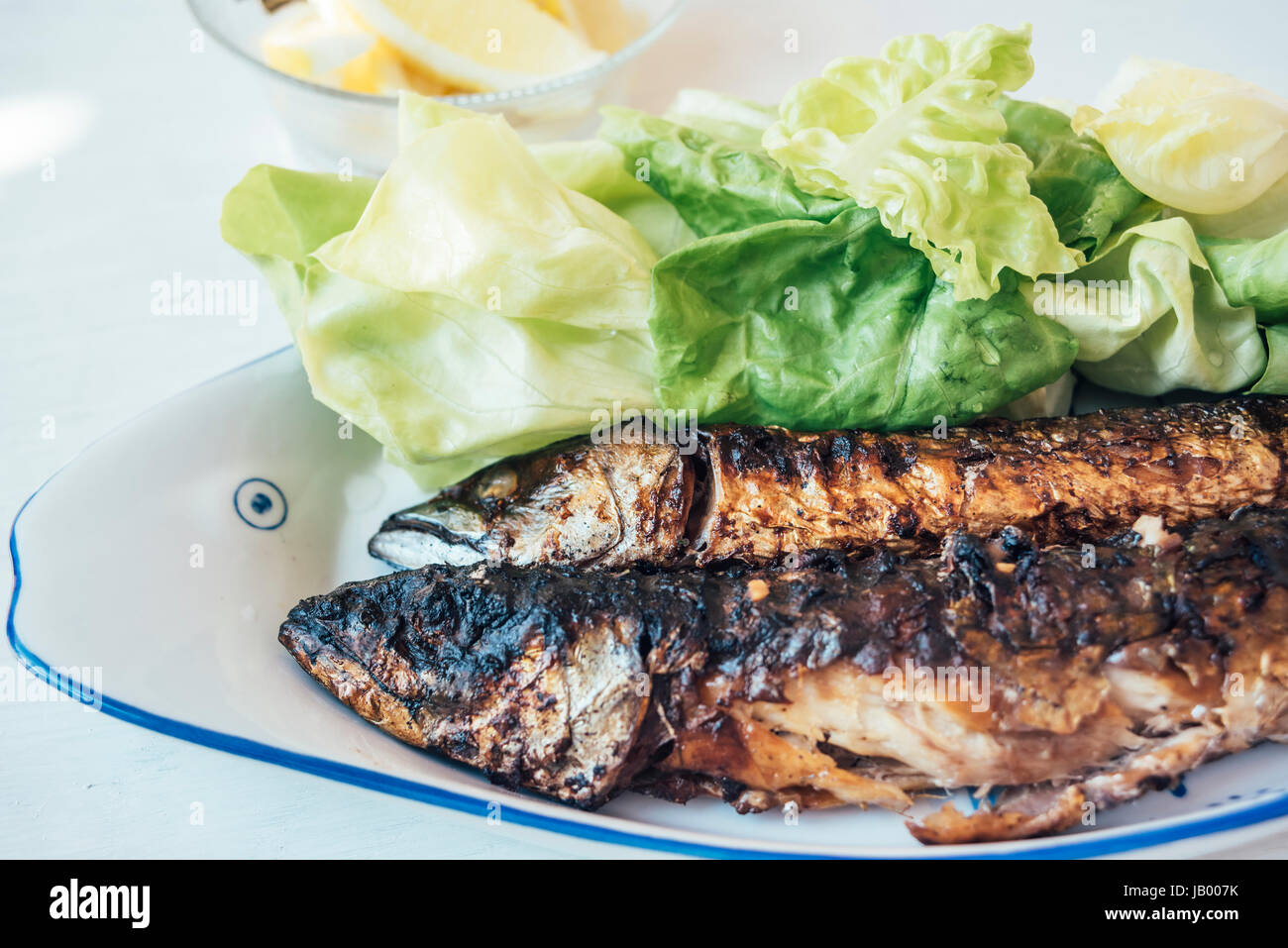 Whole grilled fish hi-res stock photography and images - Alamy